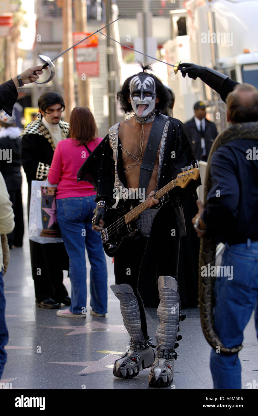 Kiss Gene Simmons. Famous costumed characters try to be photographed ...