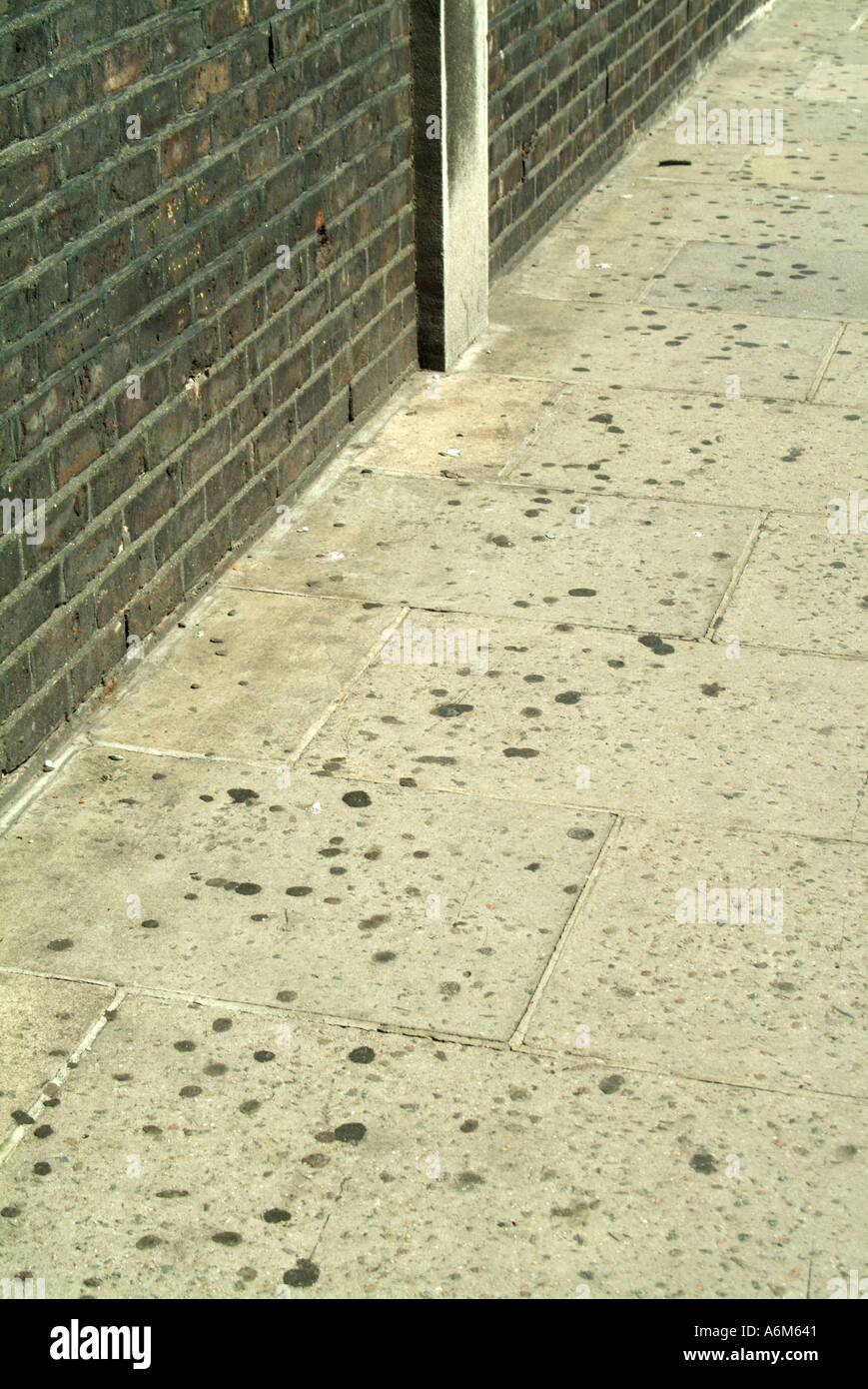 City of London chewing gum deposited on pavement slabs Stock Photo - Alamy