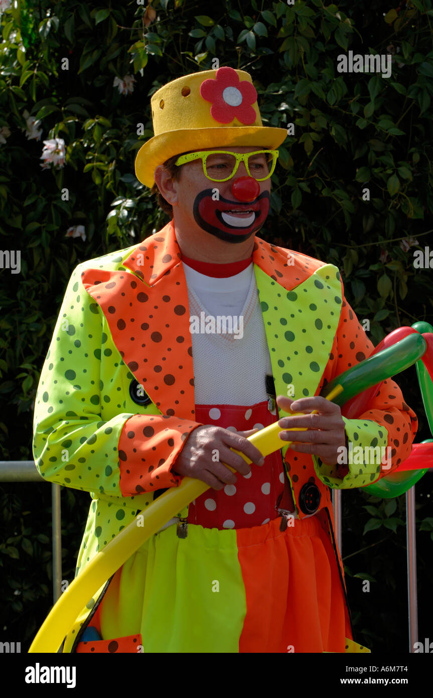 Costumed characters photograph with tourists for tips along Hollywood ...