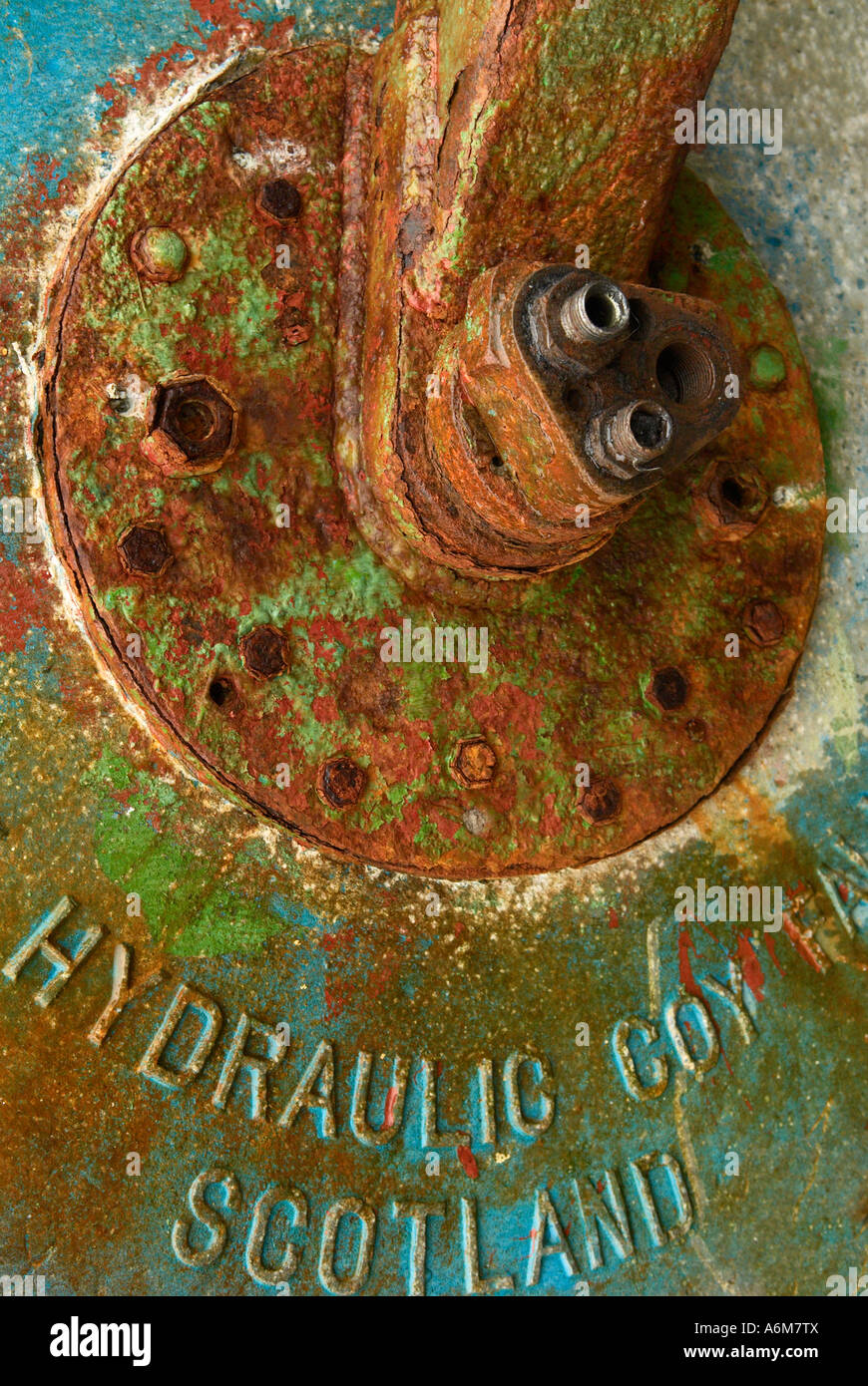 Old rusty ships parts lying around the docks of Dingle town harbor ...