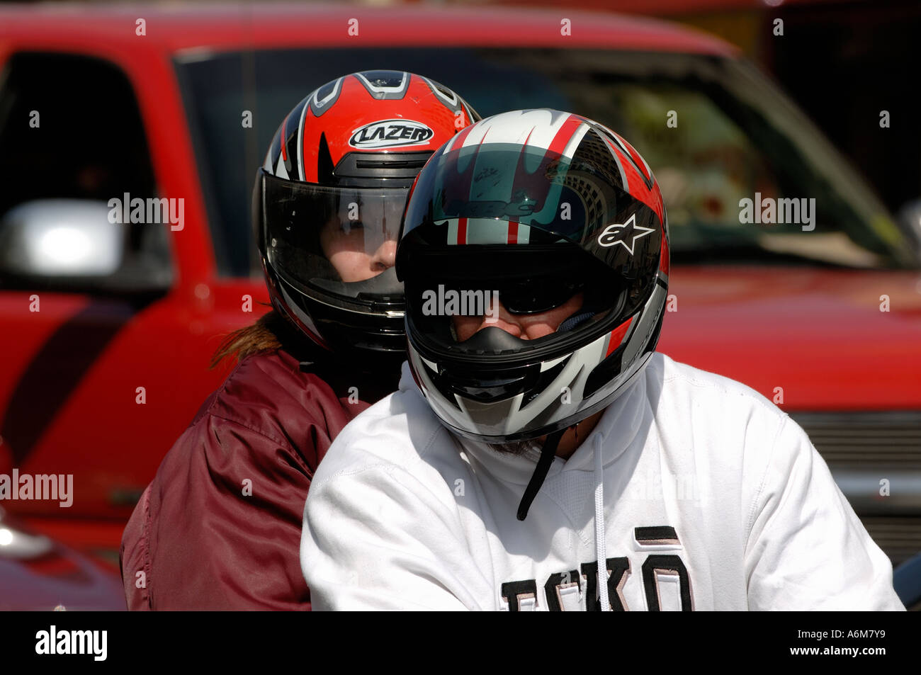Couple wearing motorbike helmets hi-res stock photography and images ...