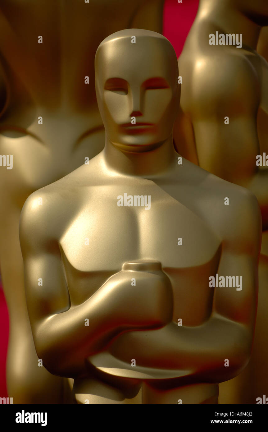Closeup of human size Oscars statues as decoration for the red carpet ...