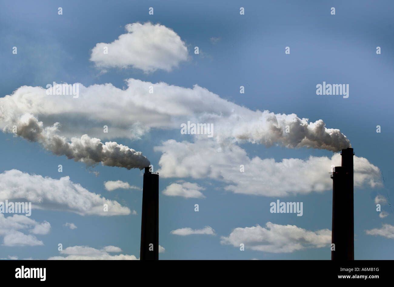 Smokestacks emitting smoke Stock Photo - Alamy