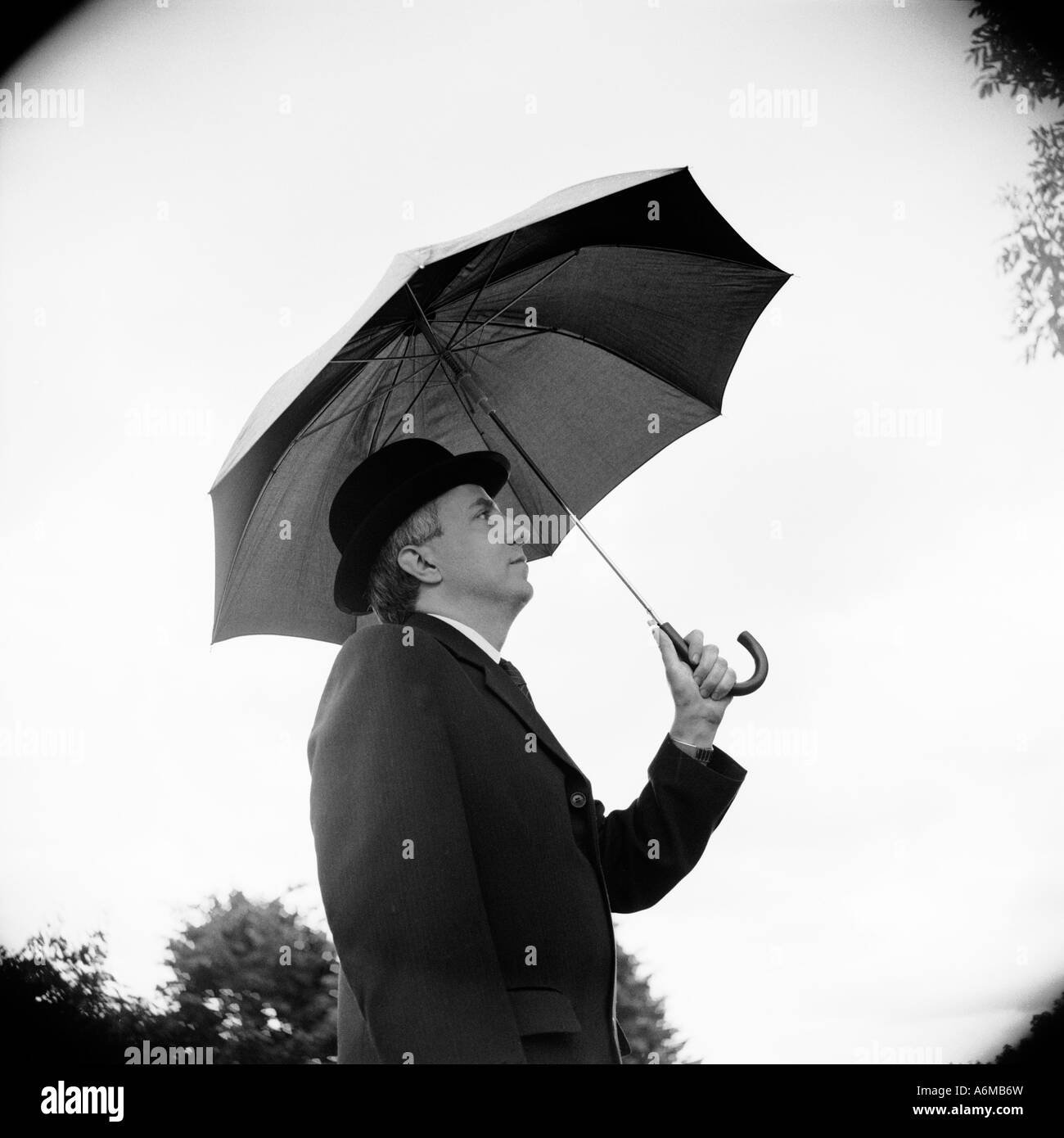 man with umbrella Stock Photo - Alamy