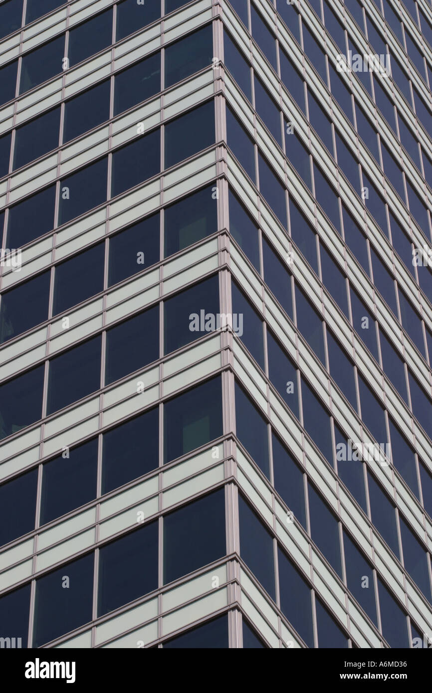 Corner edge of modern office building showing glass windows and glazing ...