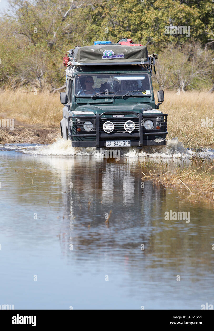 Land Rover Defender 110 Wading Through Water Stock Photo - Alamy