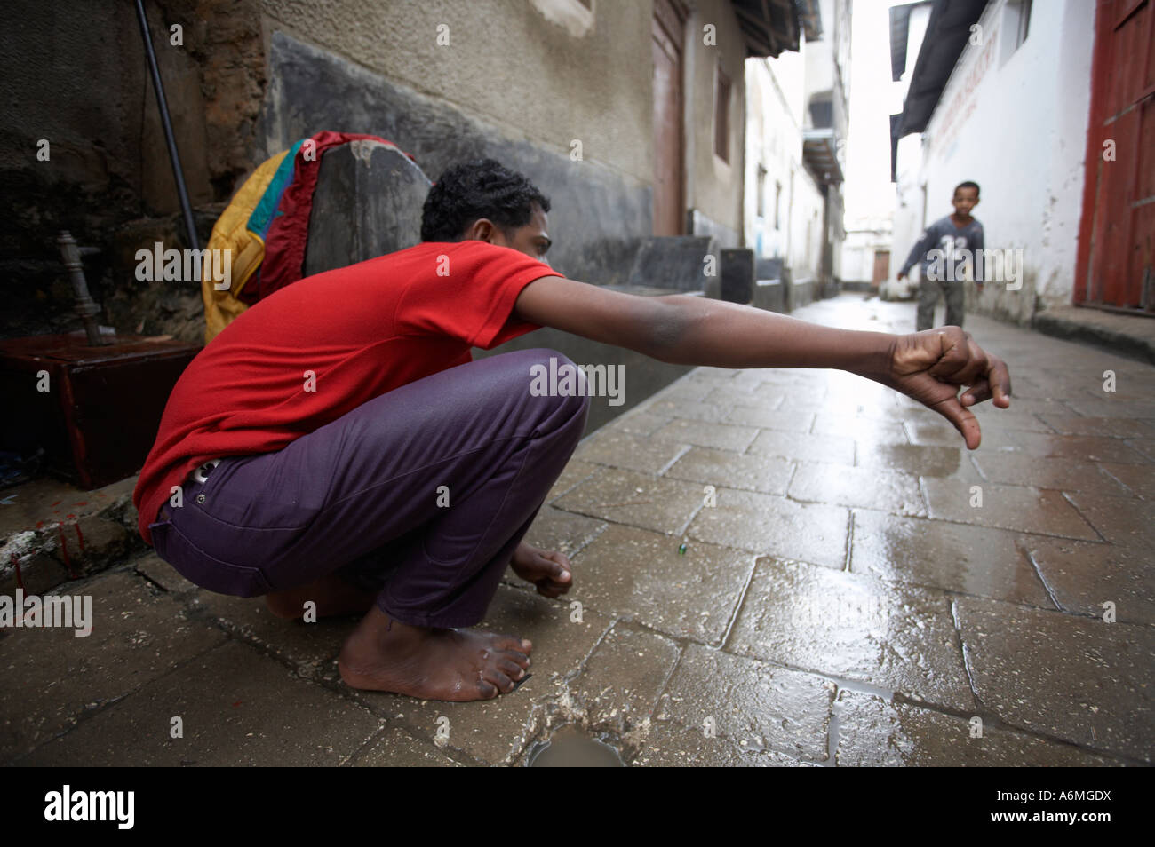 Children Playing Marbles, Zanzibar Island Stock Photo - Alamy