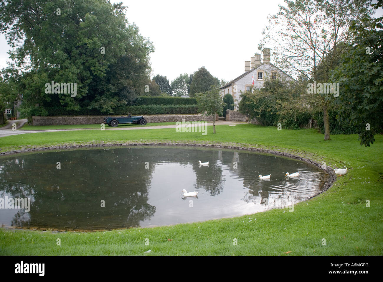 Mill pond in Foolow, Derbyshire, England Stock Photo - Alamy