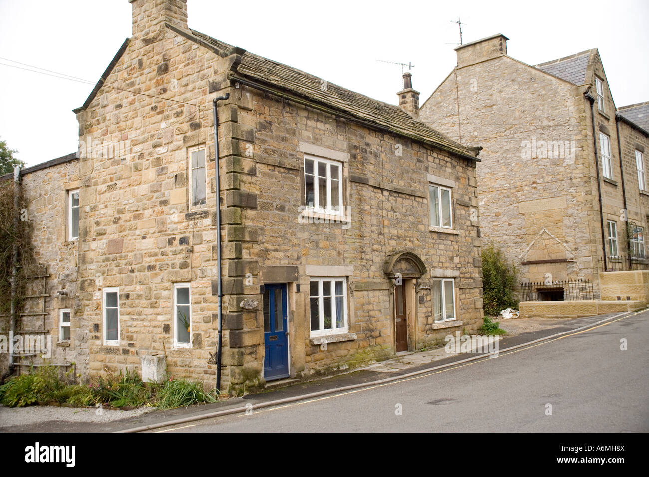 Old stone house in Eyam, Derbyshire, England Stock Photo - Alamy