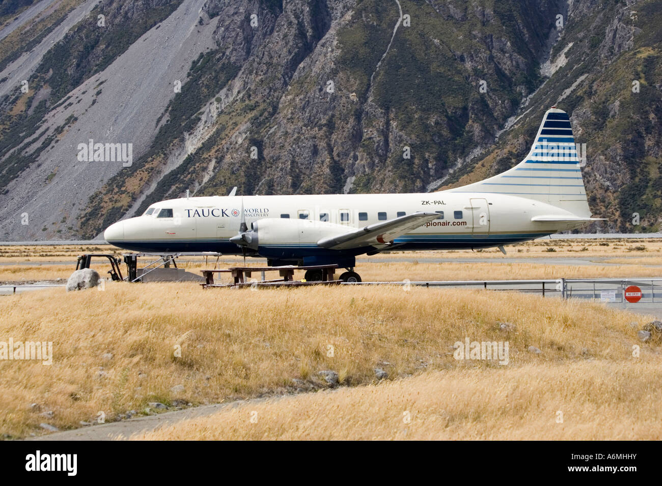 Twin prop Tauck World Discovery aircraft on runway Mount Cook National ...