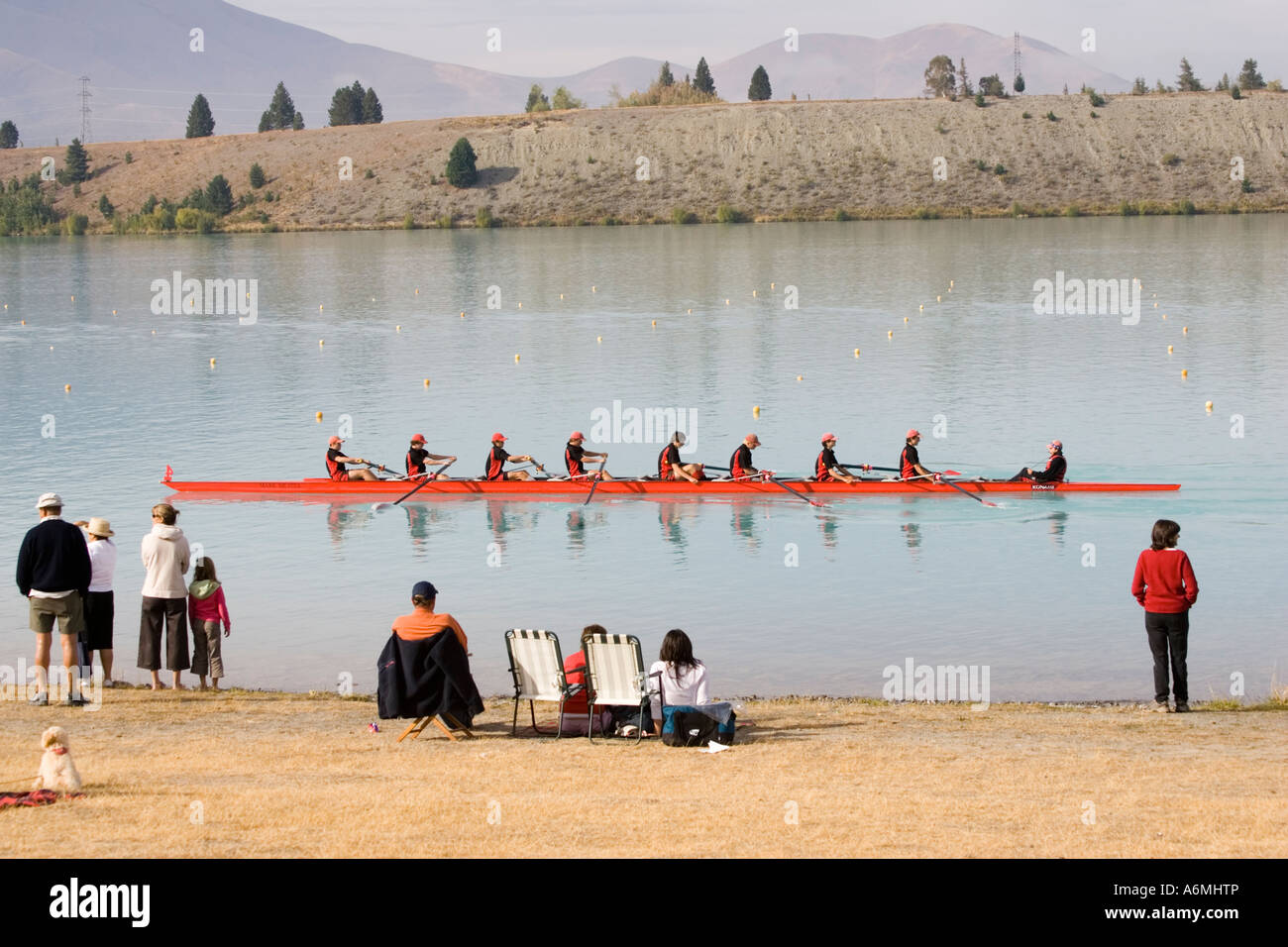 Spectators watching rowing scull competing in South Islands schools ...