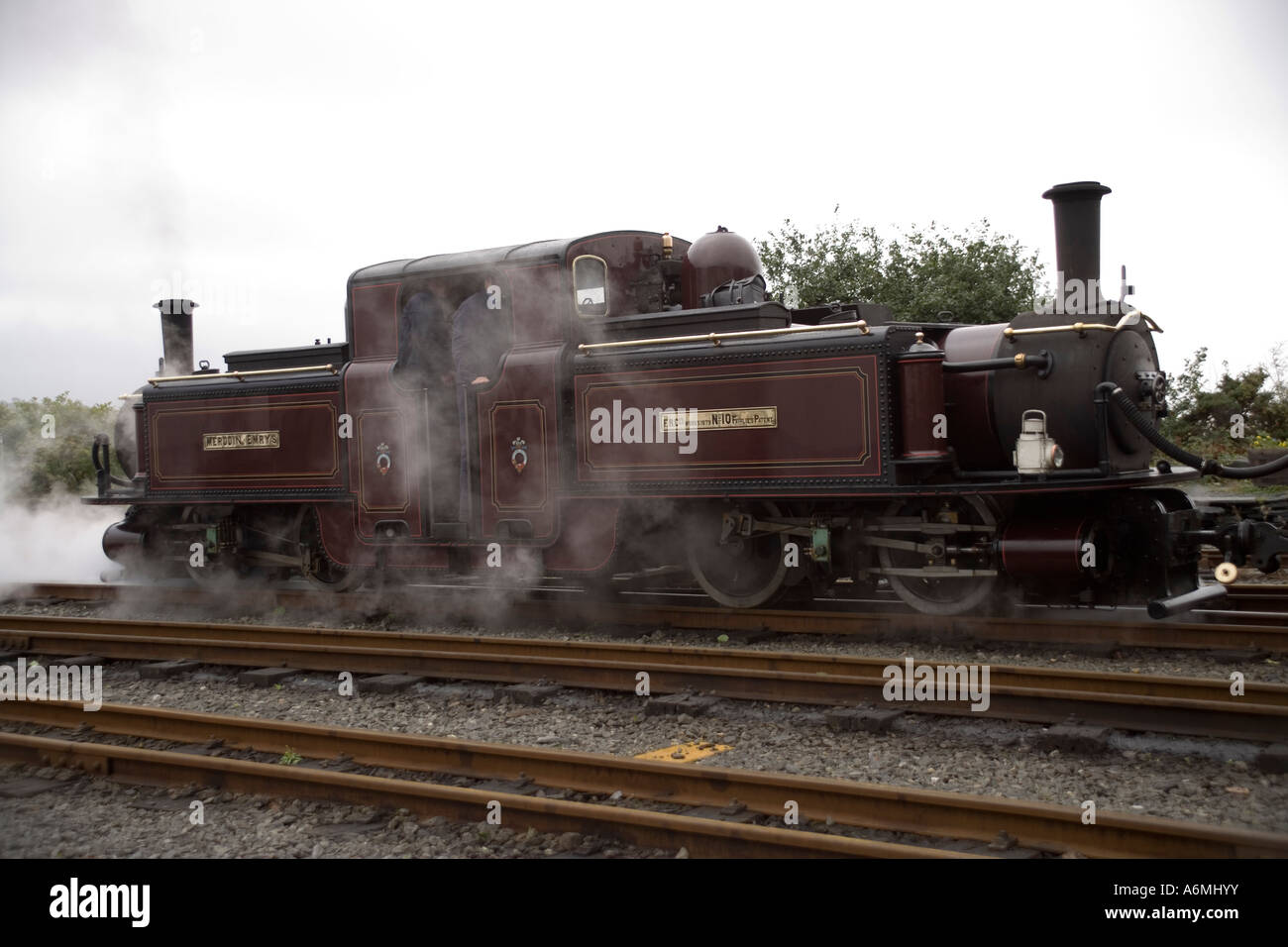 Steam train called Merddin Emrys on the cob arriving at Porthmadog on ...