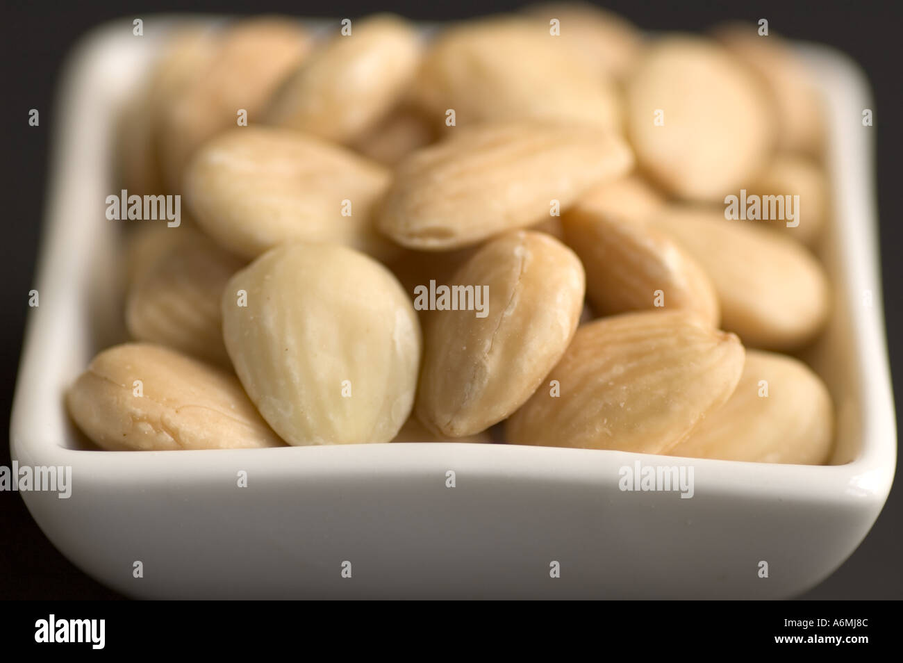 Roast marcona almond nuts in a bowl Stock Photo - Alamy