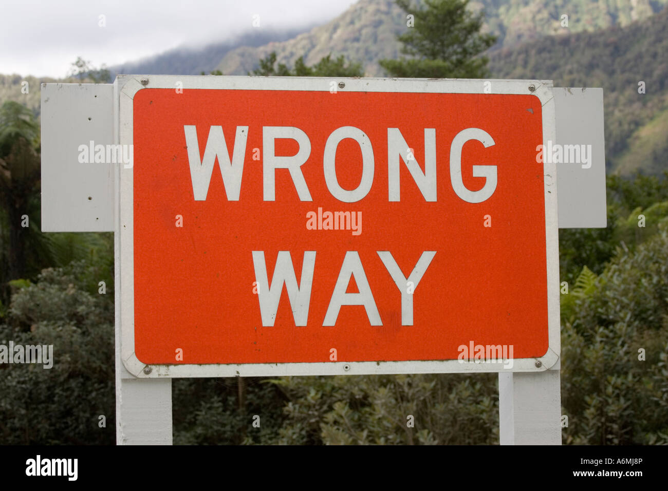 Bright red sign wrong way Franz Josef glacier Westland National Park ...