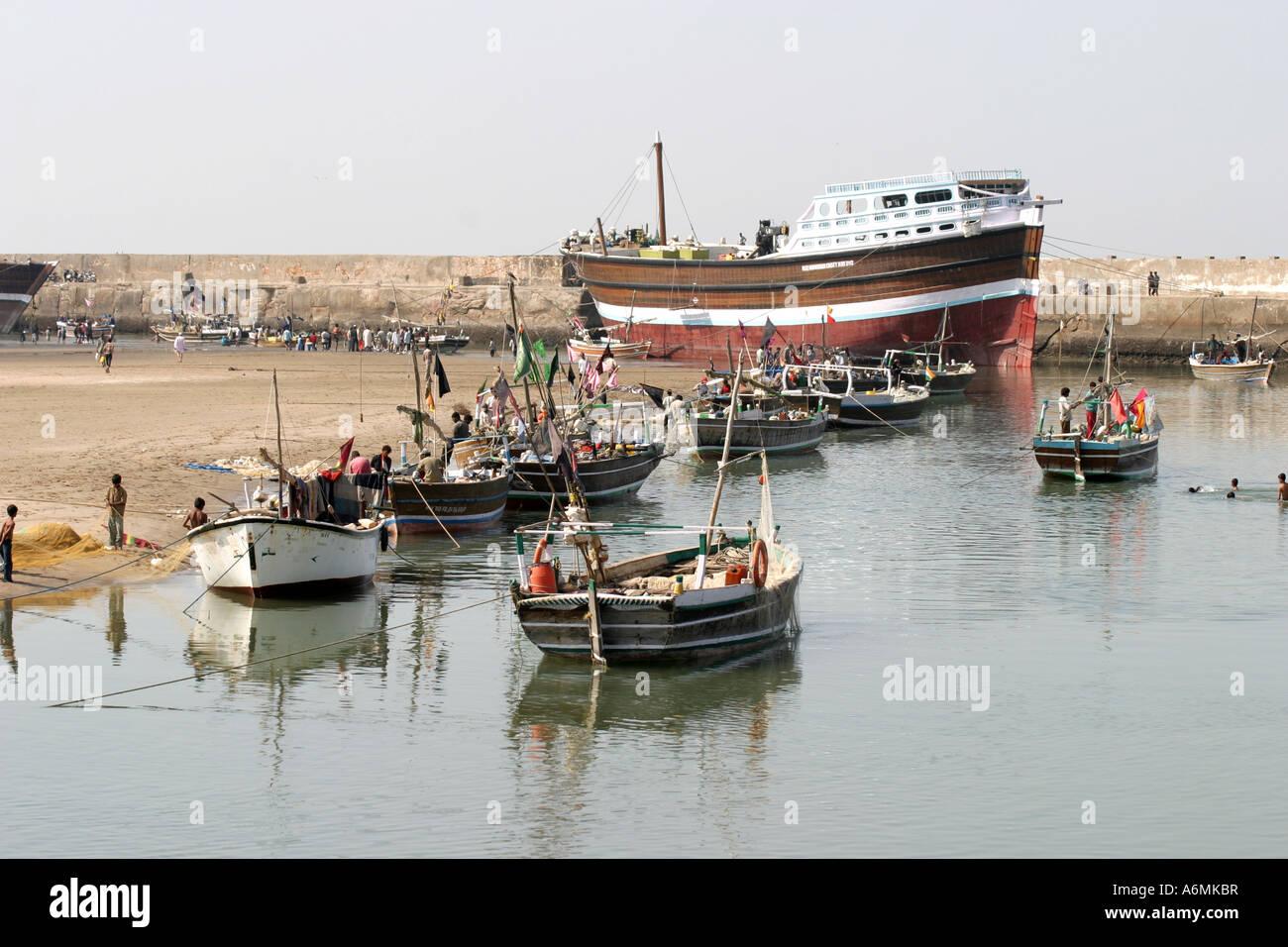 Boat building and fishing on the Rukmavati River,Mandvi Port in the ...