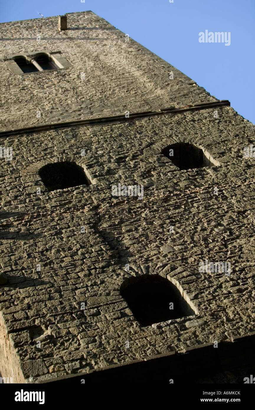 Angle view of window openings in old stone building in El Barri Gotic ...
