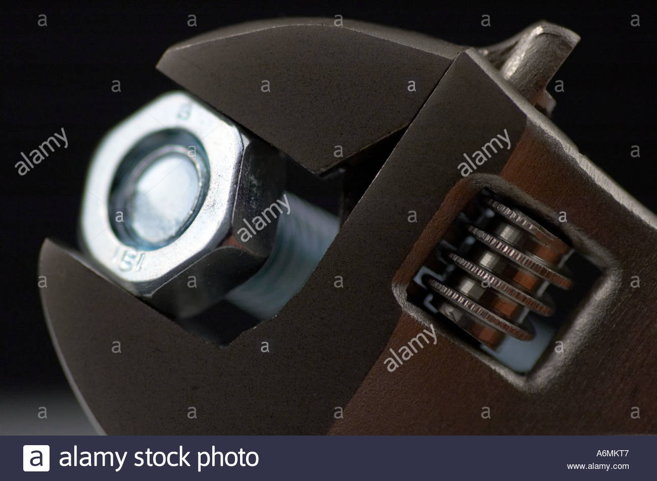 Closeup of a spanner wrench, nut and bolt Stock Photo - Alamy
