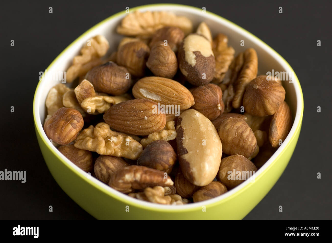 Mixed brazil hazel walnut nuts in a bowl Stock Photo - Alamy