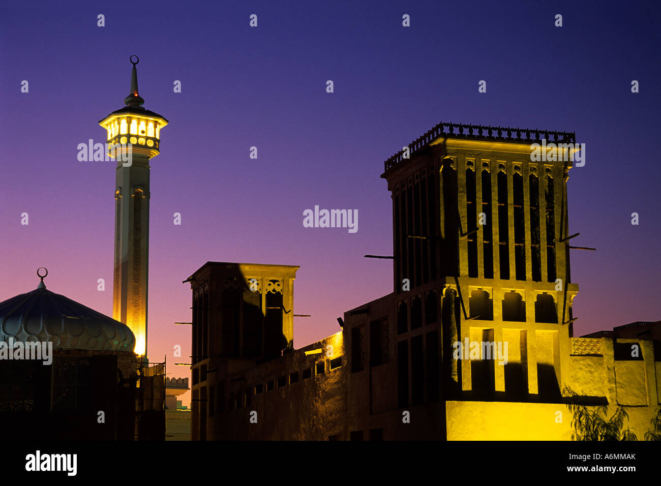 Wind tower and mosque at dusk Dubai United Arab Emirates Stock Photo ...