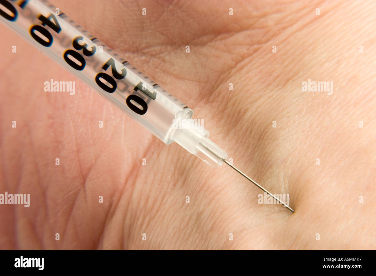 Hypodermic Syringe entering vein Stock Photo - Alamy