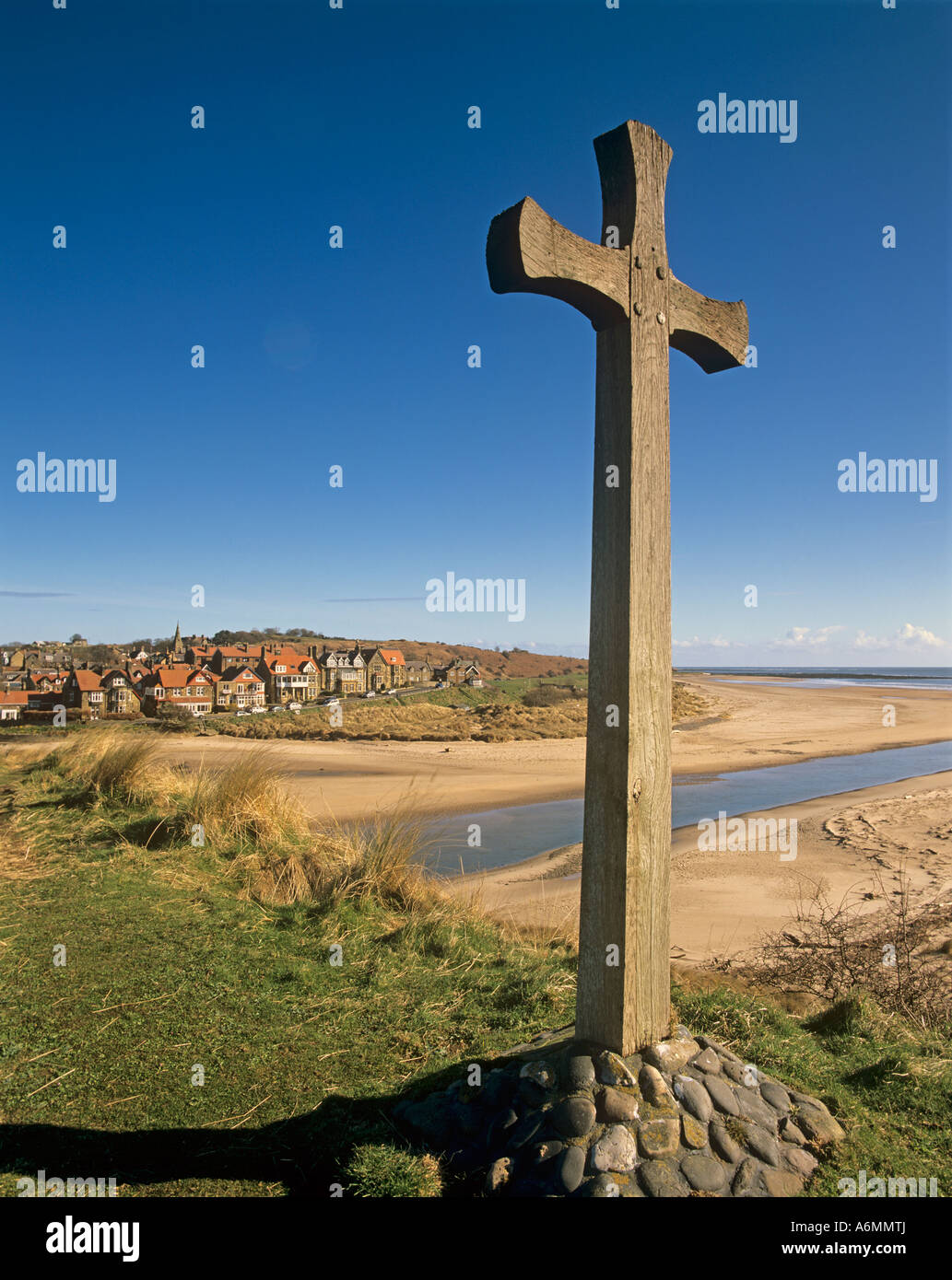 St Cuthberts Cross overlooks the estuary of the River Aln and the ...