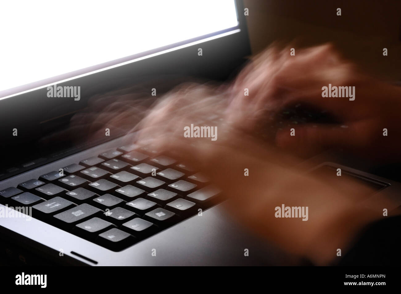 Hands with motion blur from typing very fast Stock Photo - Alamy