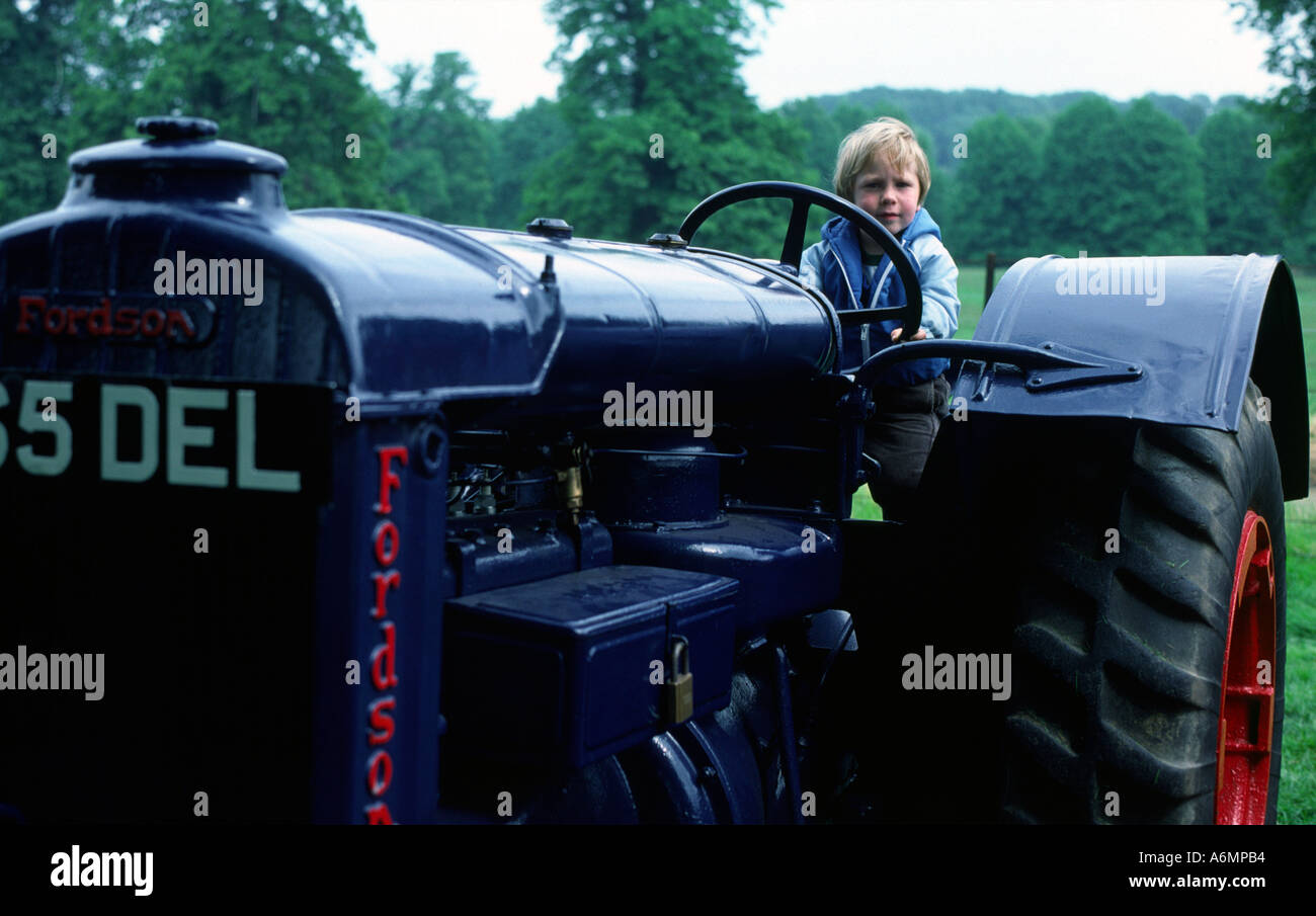 Small boy on Fordson tractor Stock Photo - Alamy