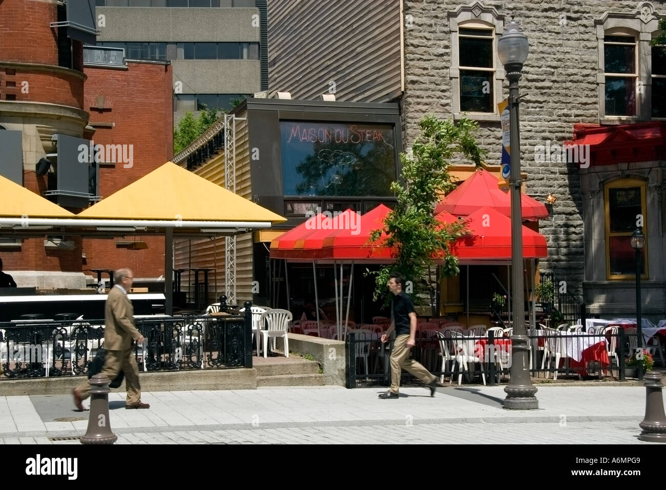 Street scene and sidewalk cafe along the Grande Allee in Quebec City ...