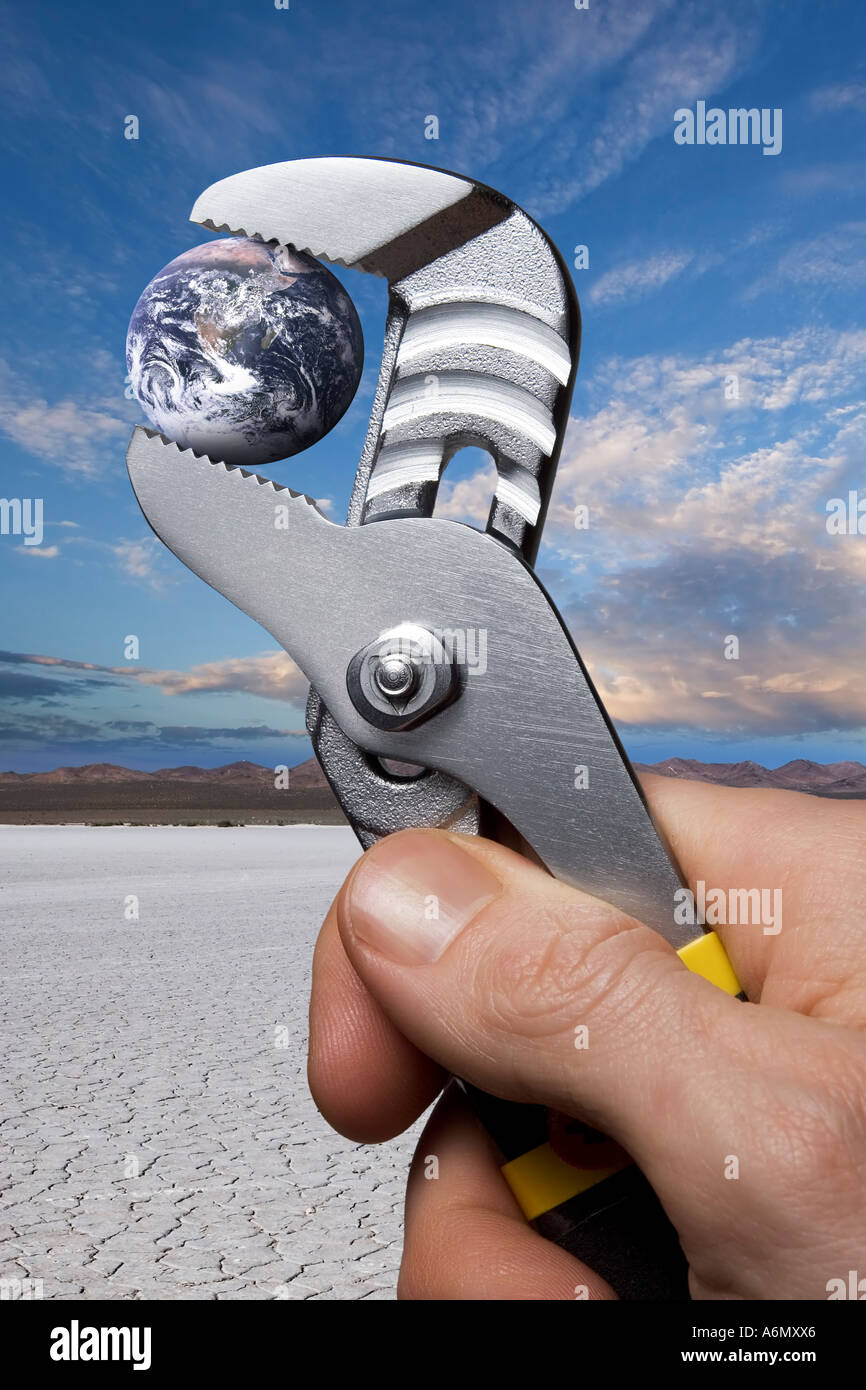 photo-illustration of the earth being squeezed in a pair of pliers ...