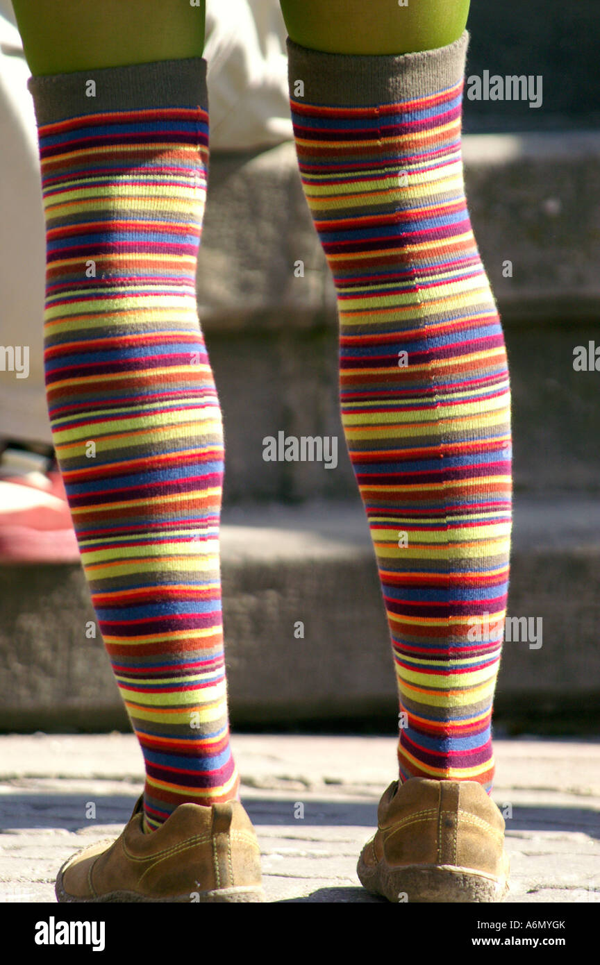 Lady legs with colourful strip socks Stock Photo - Alamy