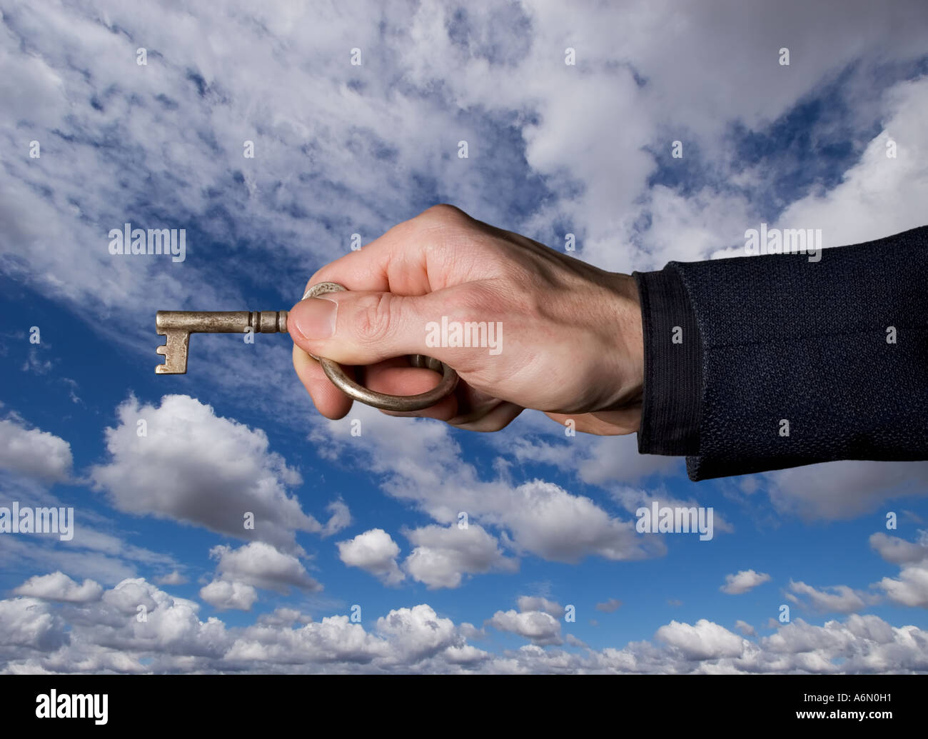 Hand holding an antique key Stock Photo - Alamy