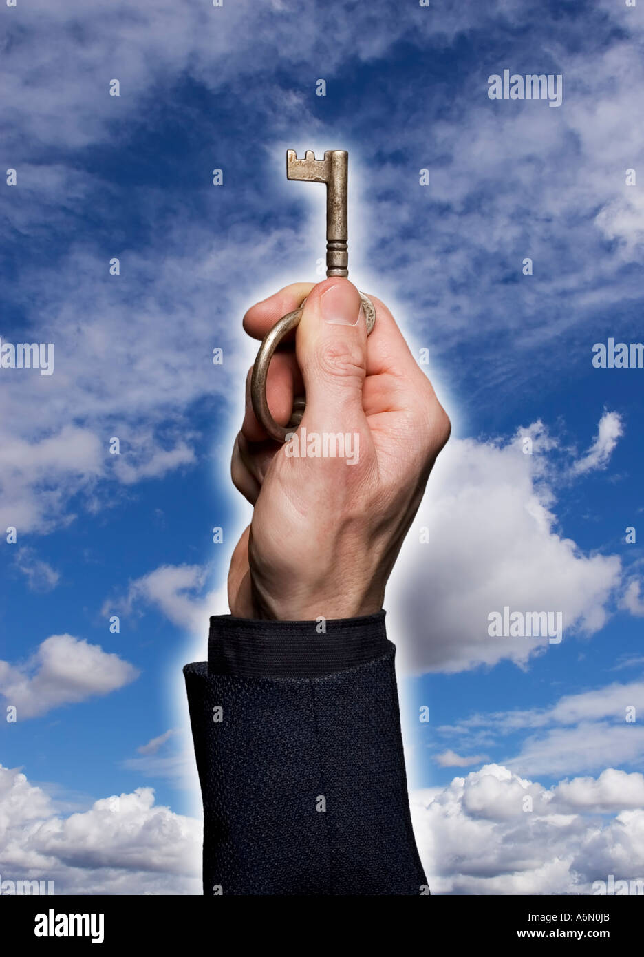 Hand holding an antique key Stock Photo - Alamy