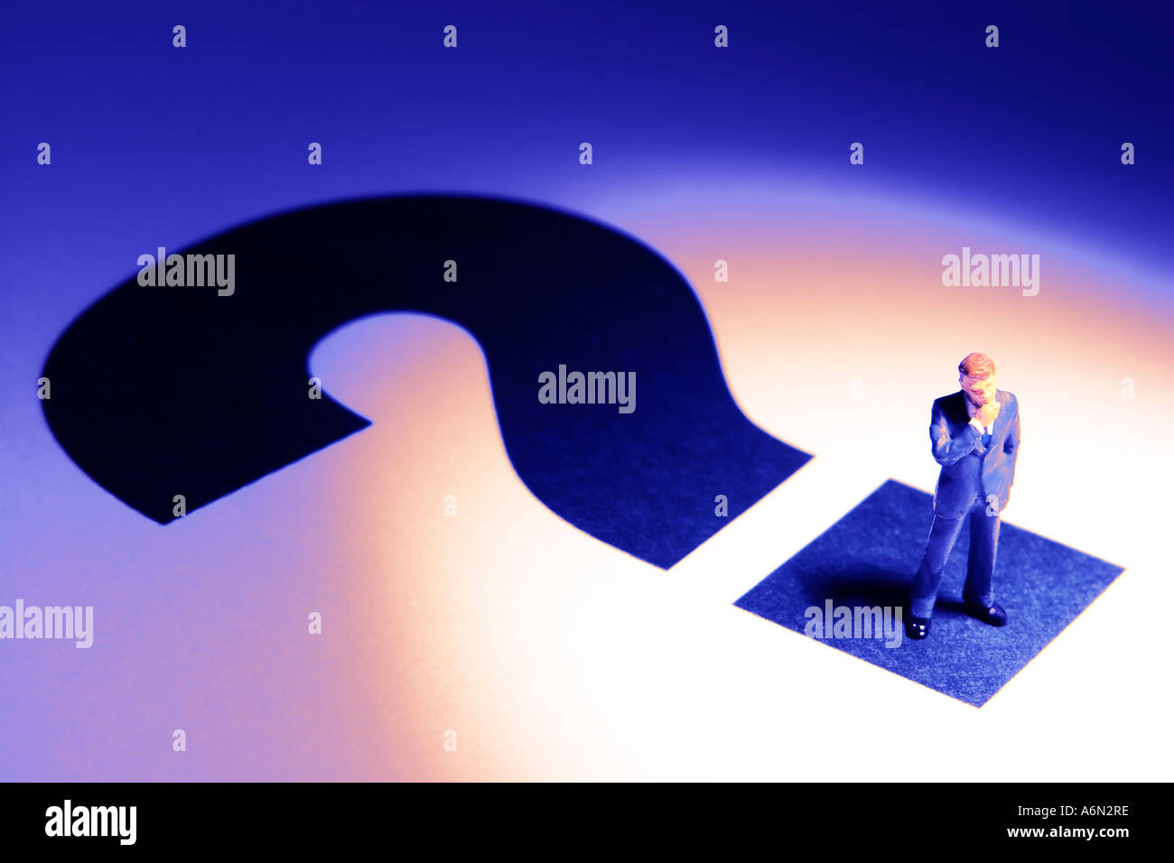 Business figurine and question mark Stock Photo - Alamy