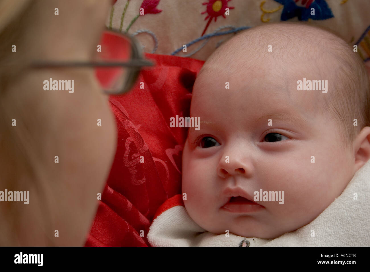 Mother and baby making eye contact Stock Photo - Alamy