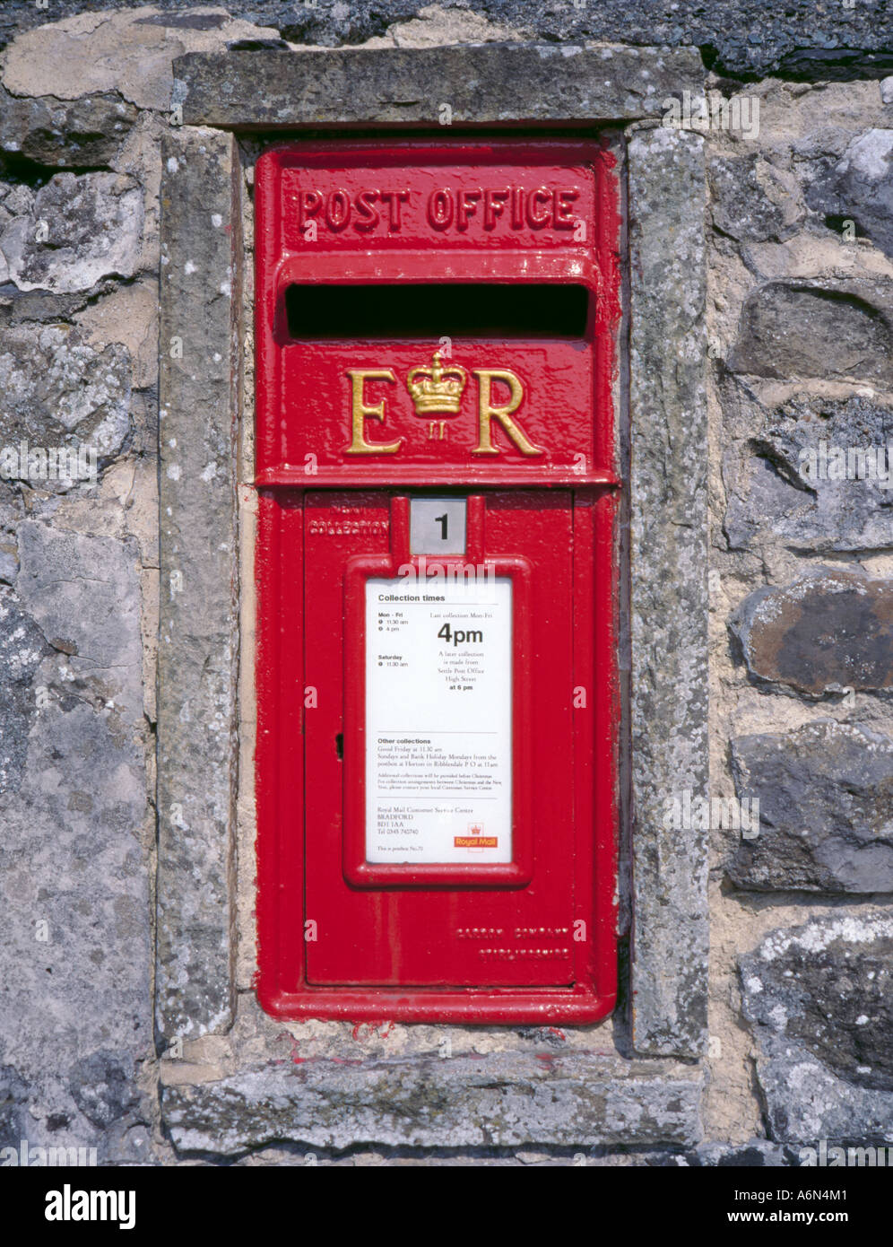 Red cast iron post box set in a wall, Horton-in-Ribblesdale, Yorkshire ...