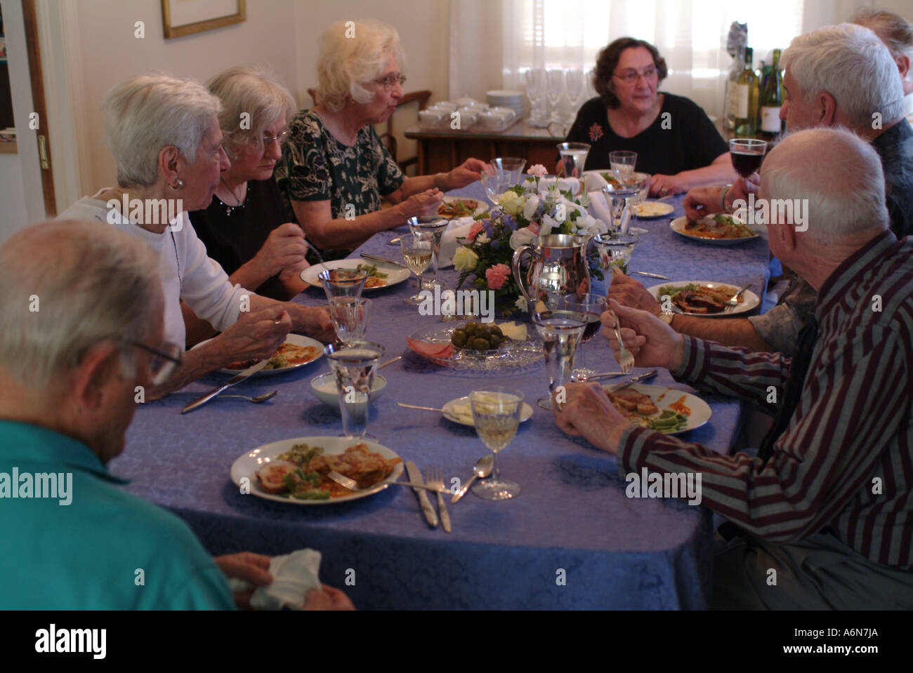 Eating a meal together Stock Photo - Alamy