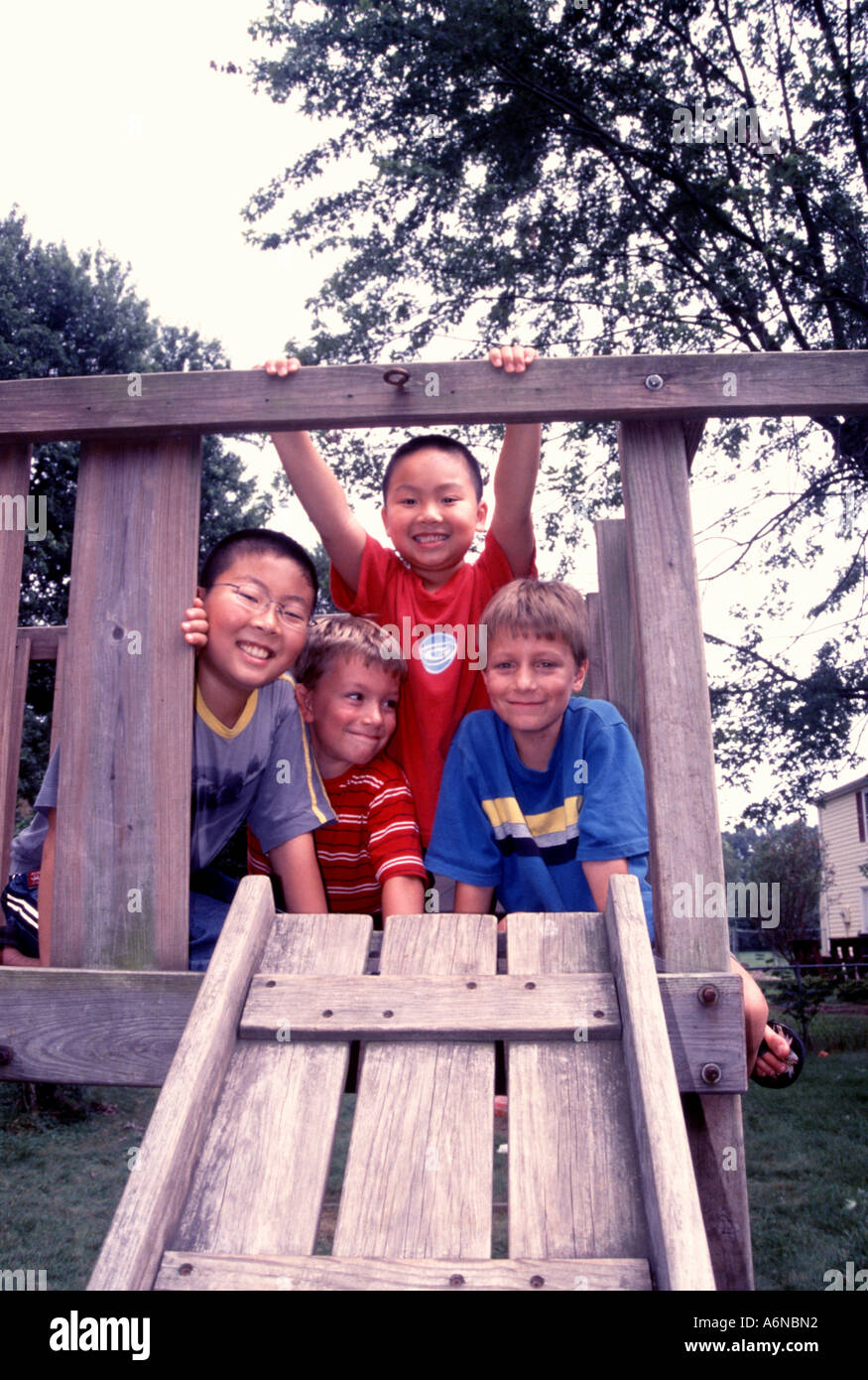 Kids playing together Stock Photo - Alamy