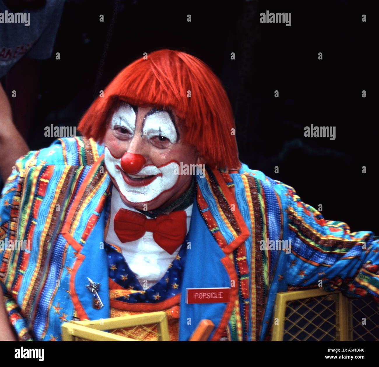 Smiling clown with red hair Stock Photo - Alamy