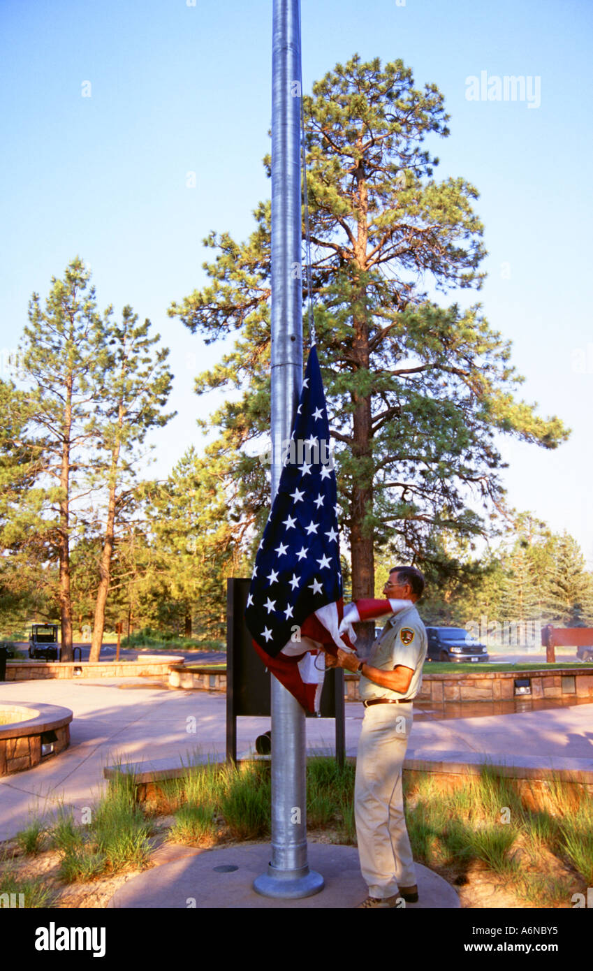 Ranger raising the US flag in Bryce Canyon National Park Utah USA Stock ...