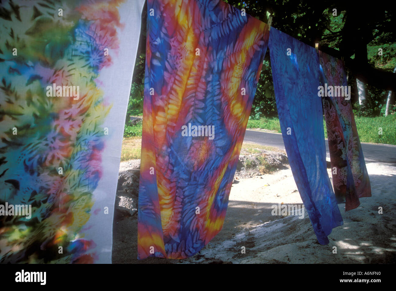 Homemade dyed fabrics drying on washing line, South Pacific Stock Photo ...
