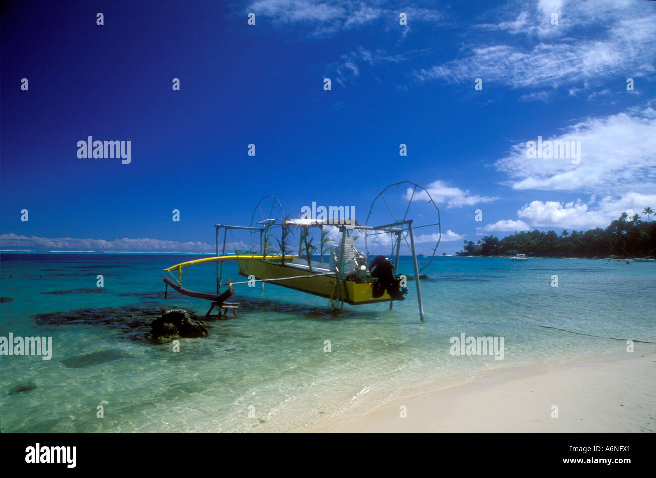 Yellow boat in stand above lagoon to stop damage from elements, Bora ...
