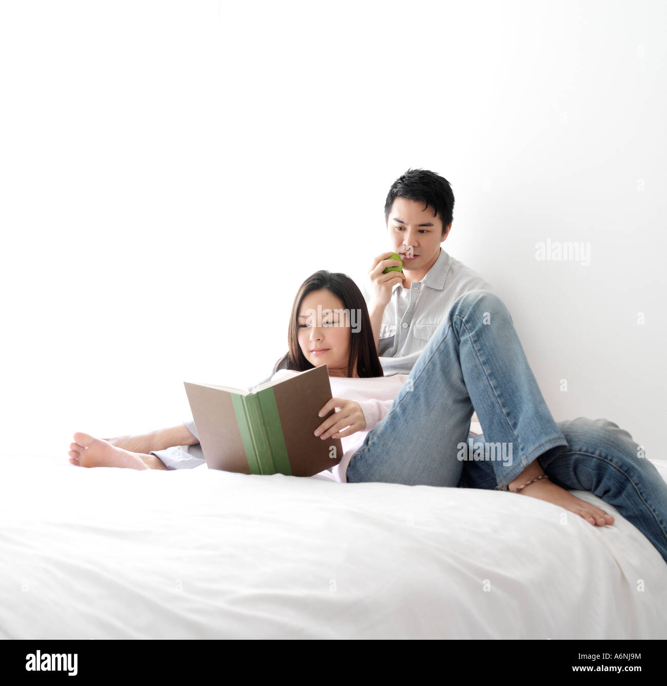 Woman lying in mans lap hi-res stock photography and images - Alamy