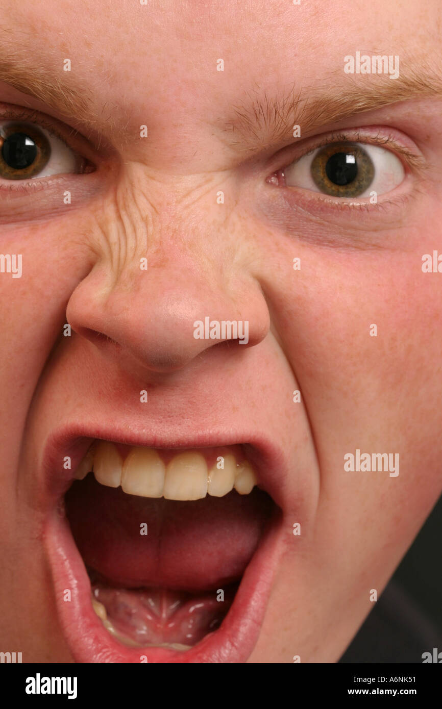 Angry face of a teenager Stock Photo - Alamy