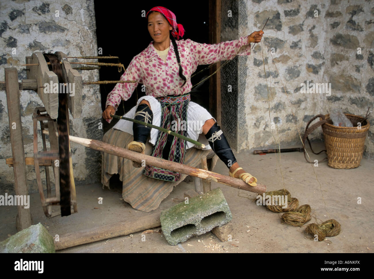 Woman twisting hemp North Guangxi China Asia Stock Photo - Alamy