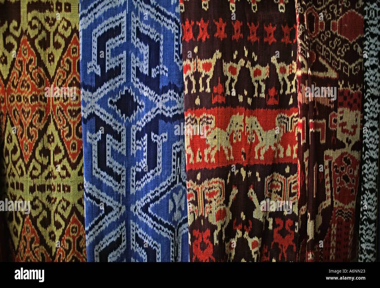 Selection of Indonesian fabrics from Sumba hanging on a market stall in ...