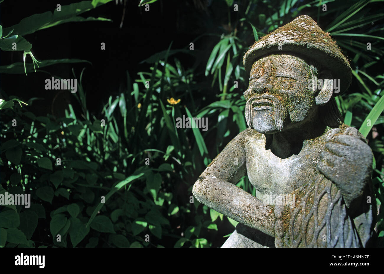 Stone carving of a fisherman Ubud Bali Indonesia Stock Photo - Alamy
