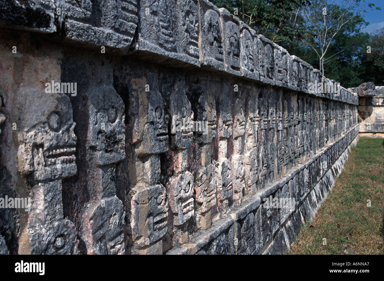 Skullracks Carved skulls line the Tzompantli platform of the skulls ...