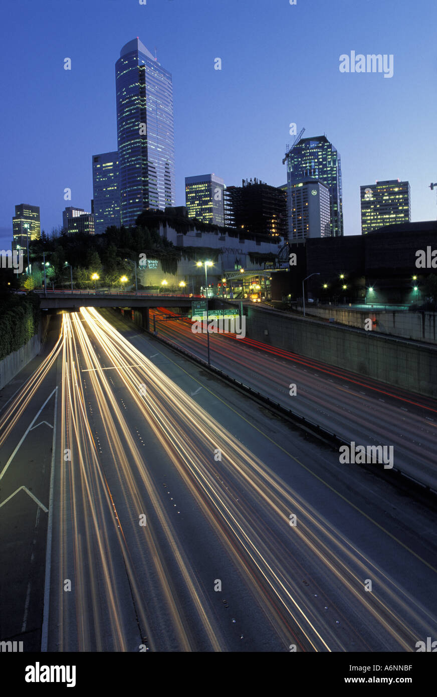 USA Washington Seattle Traffic lights on I 5 and downtown city skyline ...