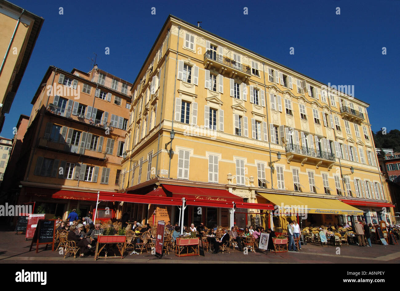 People sitting outside bars in Nice, France Stock Photo - Alamy