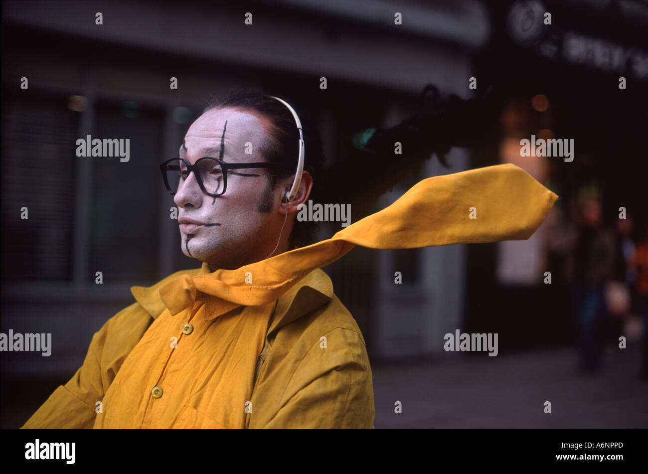 Blowing in the Wind — Mime street entertainer on bicycle with stiff ...